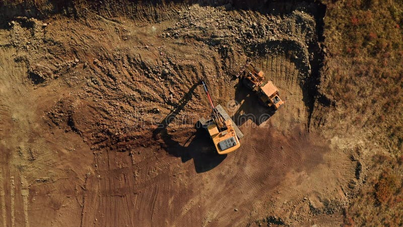 Excavator Loading Dump Truck Working on Construction Site Stock Footage ...