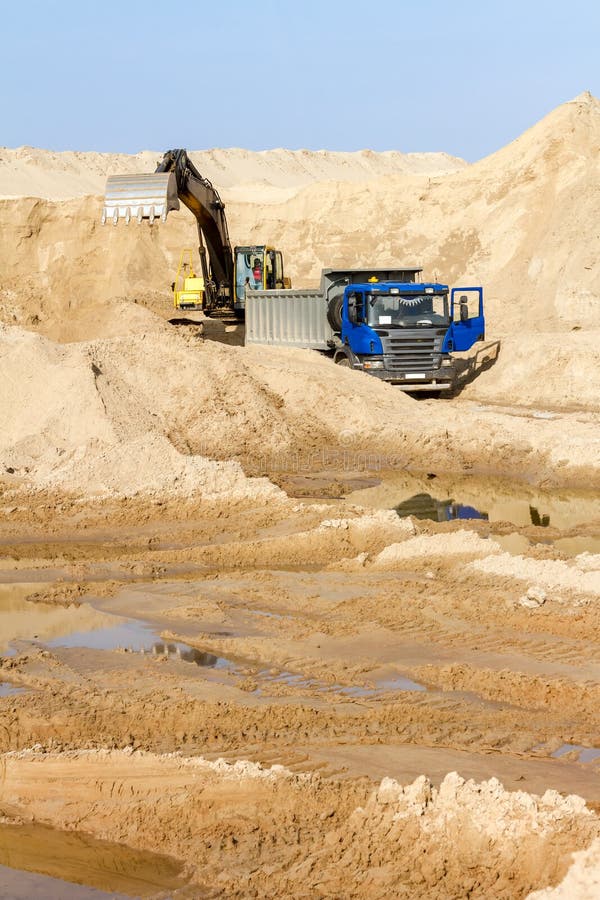 Excavator Loading Dumper Truck Stock Image - Image of picking, digging ...