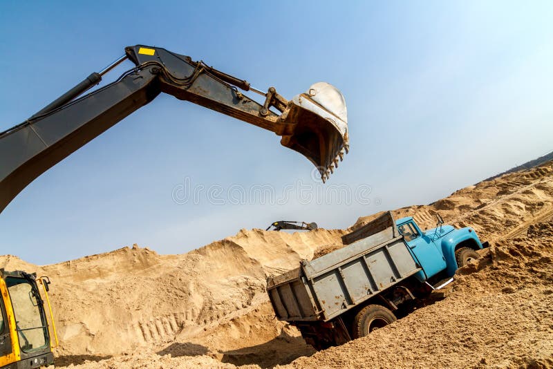 Excavator Loading Dumper Truck Stock Photo - Image of tractor ...