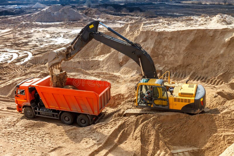 Excavator Loading Dumper Truck Stock Photo - Image of mover, picking ...