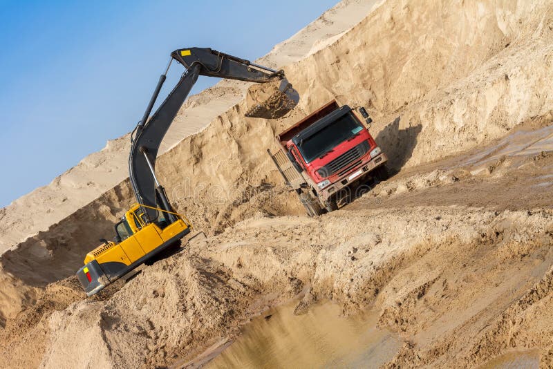 Excavator Loading Dumper Truck Stock Photo - Image of heavy, equipment ...