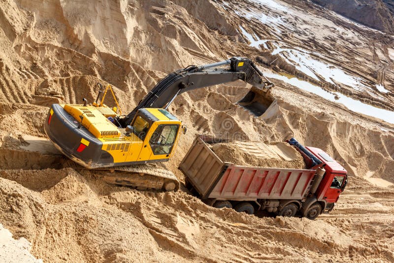 Excavator Loading Dumper Truck at Sunny Day Stock Photo - Image of ...