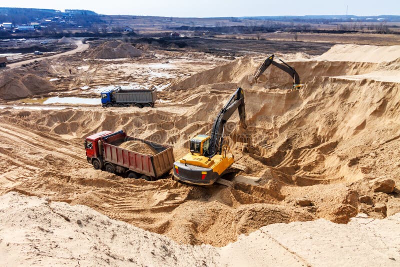 Excavator Loading Dumper Truck at Sunny Day Stock Photo - Image of ...
