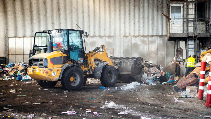 An Excavator Working at Waste Sorting Plant Stock Photo - Image of ...