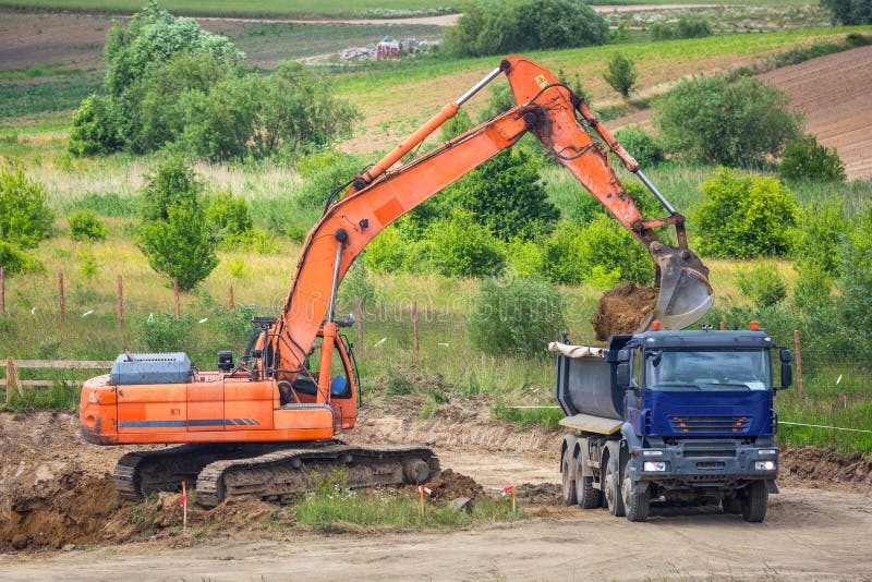 An Excavator Loading Ground Stock Image - Image of hydraulic, metal ...