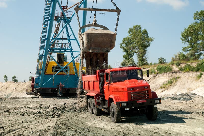 Excavator Loading a Heavy Dump Truck Stock Image - Image of loading ...