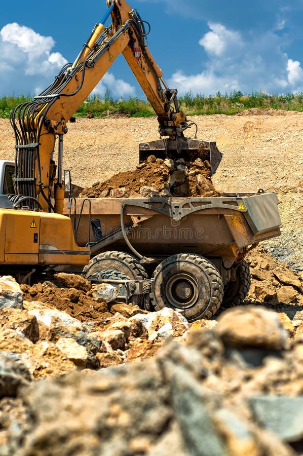 Backhoe Digging at Construction Site Stock Photo - Image of laborers ...