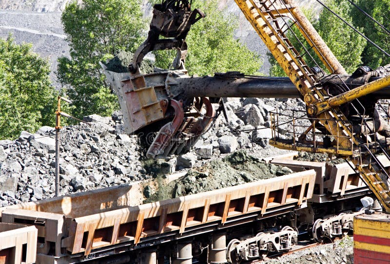 Loading of iron ore stock photo. Image of open, digger - 13253606
