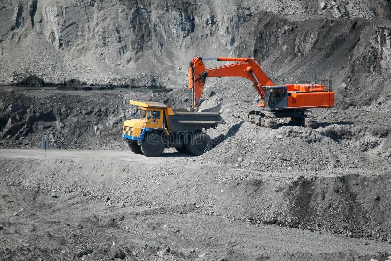 Excavator Loading Mining Truck Stock Image - Image of black ...