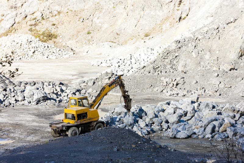 Excavator Loading Rocks at Quarry Stock Image - Image of backhoe ...