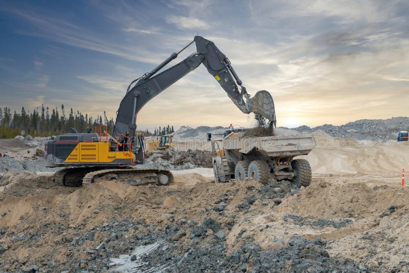 An Excavator Loads a Dump Truck Stock Image - Image of mast, wheel ...