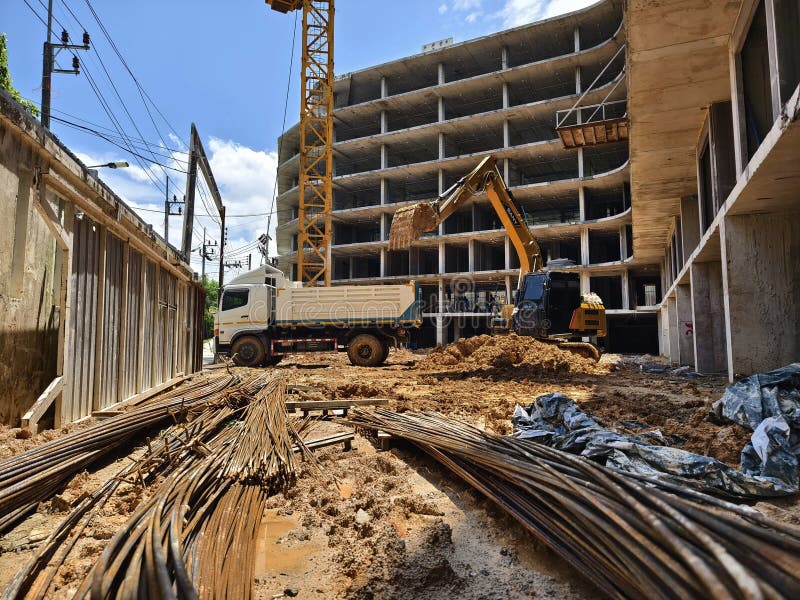 Excavator Loads Ground into a Dump Truck at a Construction Site Stock ...