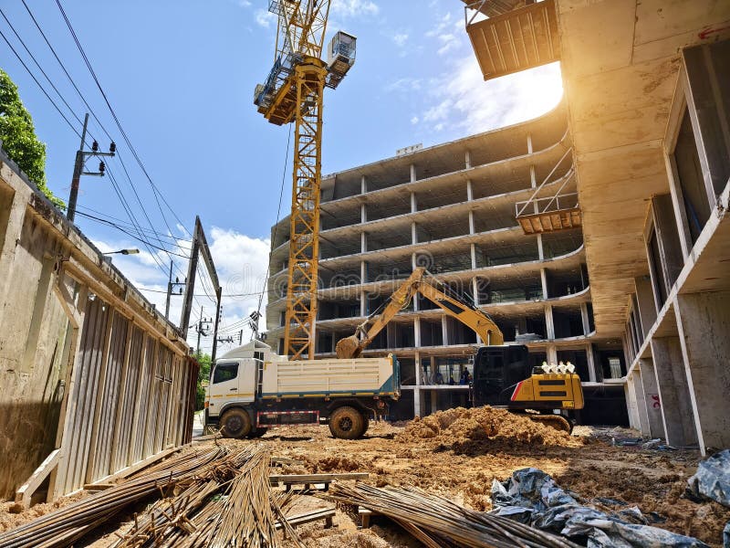 Excavator Loads Ground into a Dump Truck at a Construction Site Stock ...