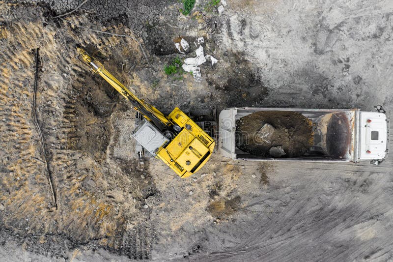 Excavator Loads Sand into the Truck Top View Stock Photo - Image of ...