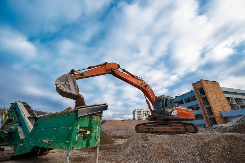 Excavator Loads Soil in Mobile Crushing and Sorting Complex Stock Image ...