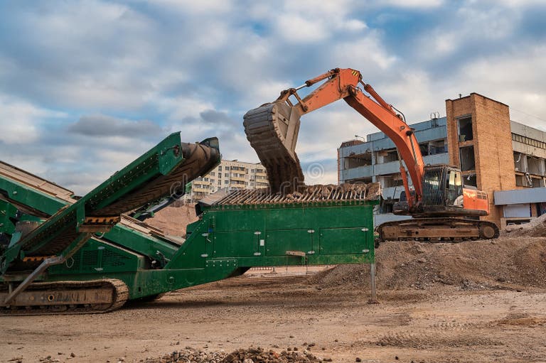 Excavator Loads Soil in Mobile Crushing and Sorting Complex Stock Image ...