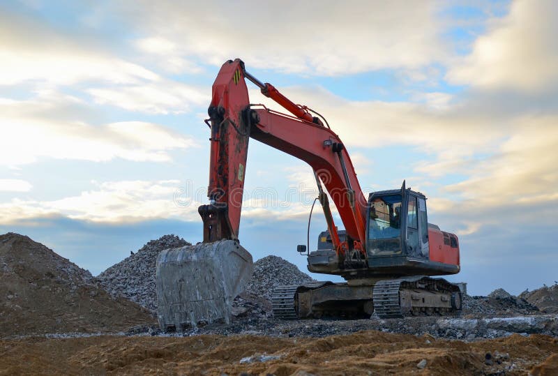 Excavator Loads of Stone and Rubble for Processing into Cement or ...