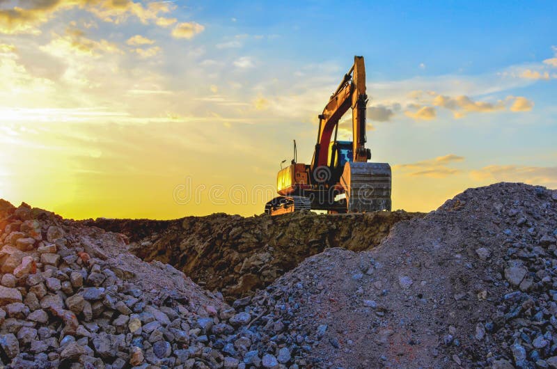 Excavator Loads of Stone and Rubble for Processing into Cement or ...