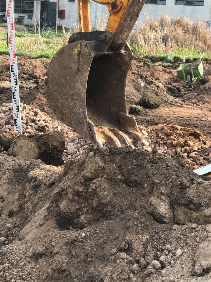 Excavator Machine at a Construction Site. Buildings Stock Image - Image ...