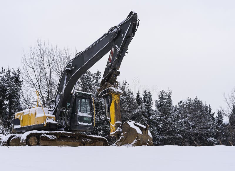 Excavator Machine Covered with Some Snow in Winter Time Stock Photo ...