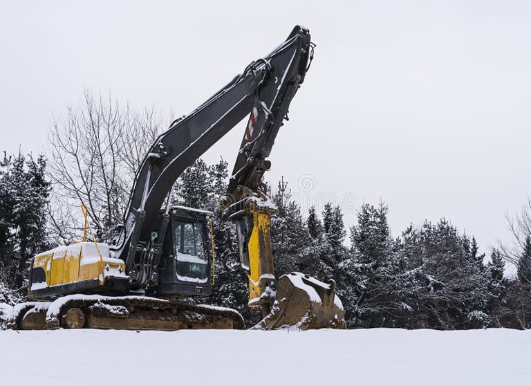 Excavator Machine Covered with Some Snow in Winter Time Stock Photo ...