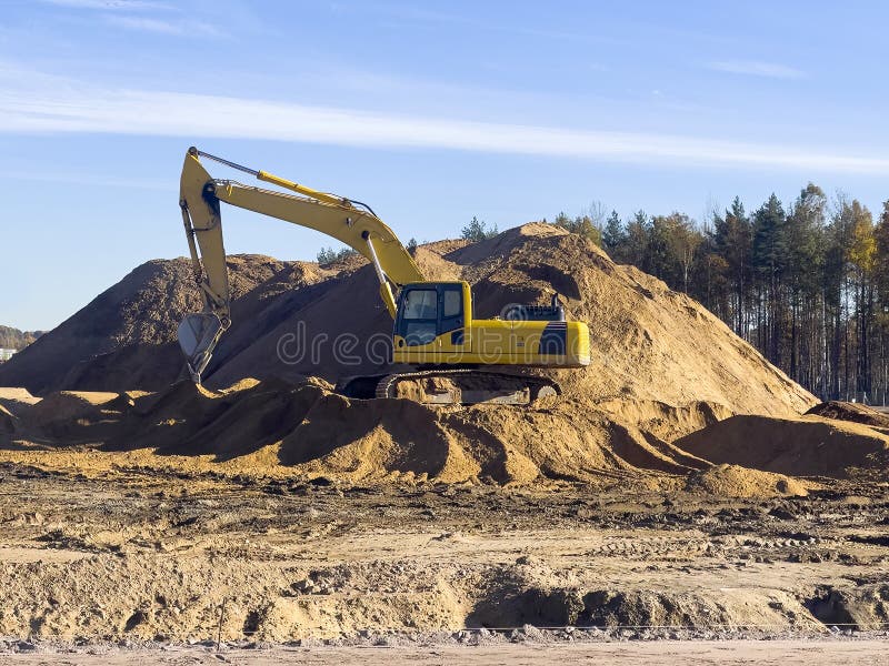 Excavator Machine at Excavation Earthmoving Work in Sand Quarry Stock ...