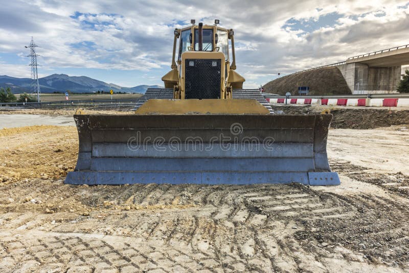 Excavator Machine Leveling the Ground with a Large Shovel Stock Image ...