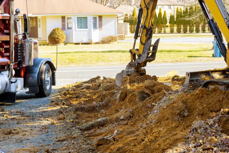 Excavator Machine Unloading Soil Earth Moving Stock Photo - Image of ...