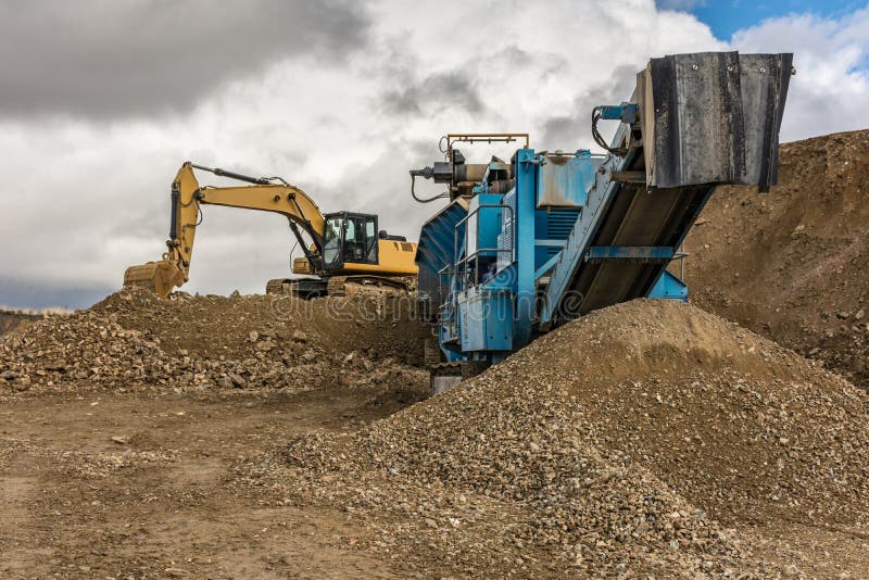 Excavator and Machinery in an Outdoor Mine Stock Photo - Image of dirt ...