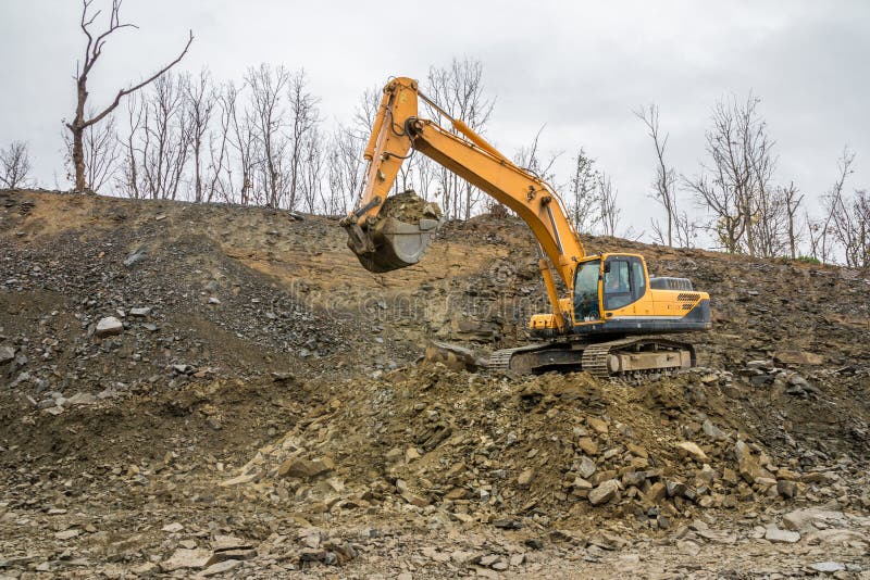 Excavator in operation editorial stock photo. Image of reconstruction ...