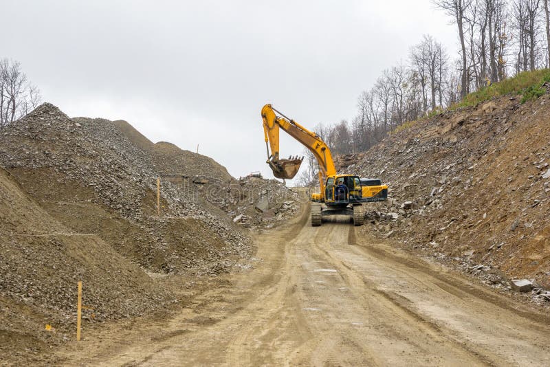 Excavator in operation editorial photo. Image of transport - 103298871