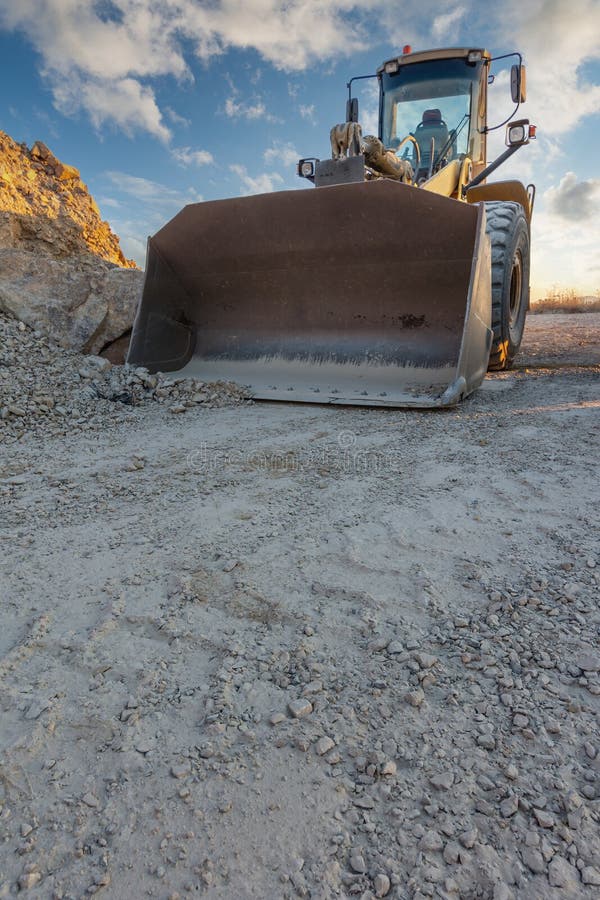 Excavator Moving Dirt and Sand at a Construction Site Stock Image ...