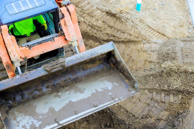 Excavator Moving Soil at Construction Site during Works Daytime with ...