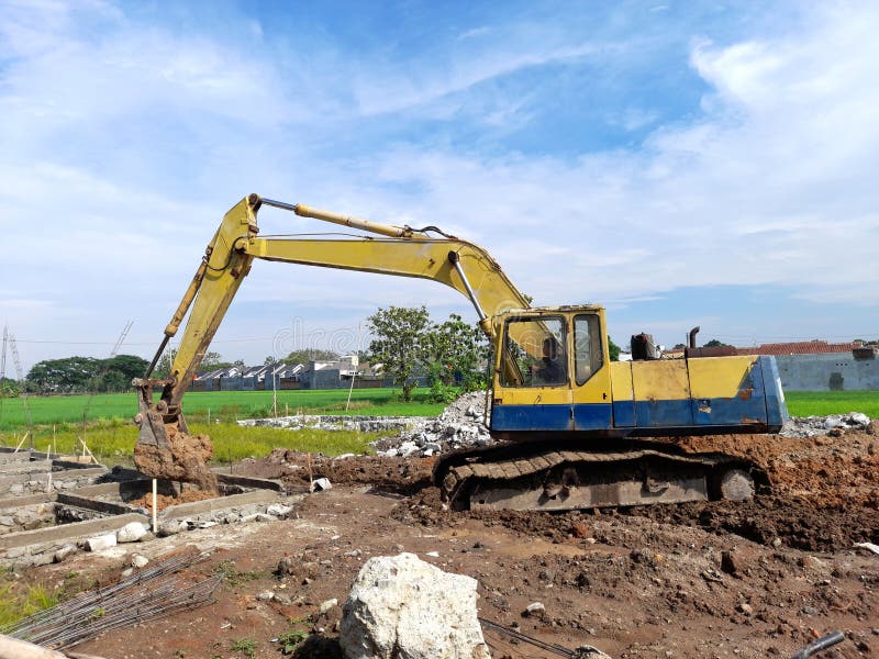 Excavator Moving Stone in a Work Stock Image - Image of industry, road ...