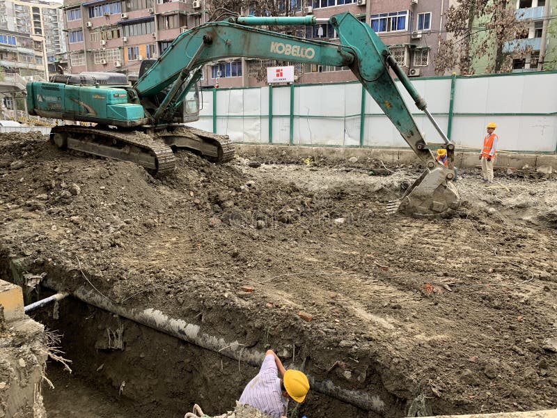 Excavator Operating on a Construction Site Editorial Stock Photo ...