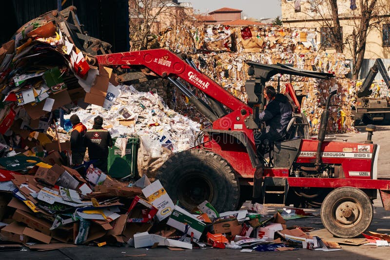 Excavator Operator Grabs Trash on a Heap Editorial Stock Image - Image ...