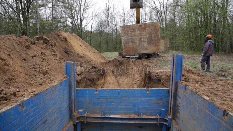 The Excavator Operator Installs the Assembled Trench Support for Trench ...