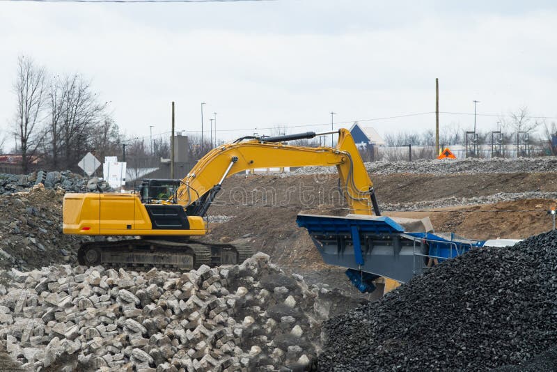 Excavator Performs Excavation Work Stock Photo - Image of development ...