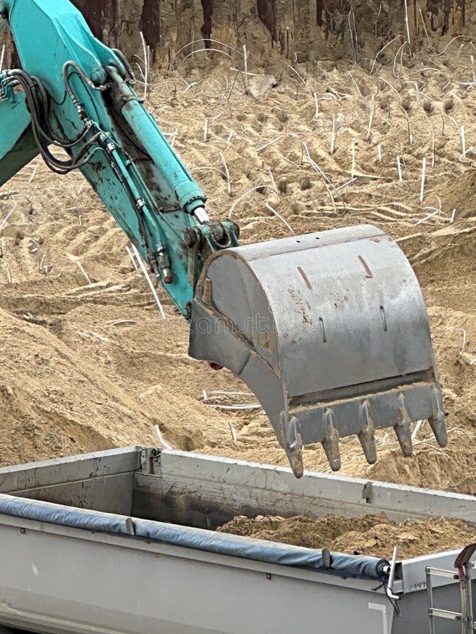 Excavator Pours Sand from the Bucket Stock Photo - Image of industry ...