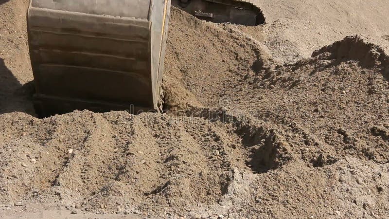 Excavator is Preparing Pile of Sand for Loading in Truck on Building ...