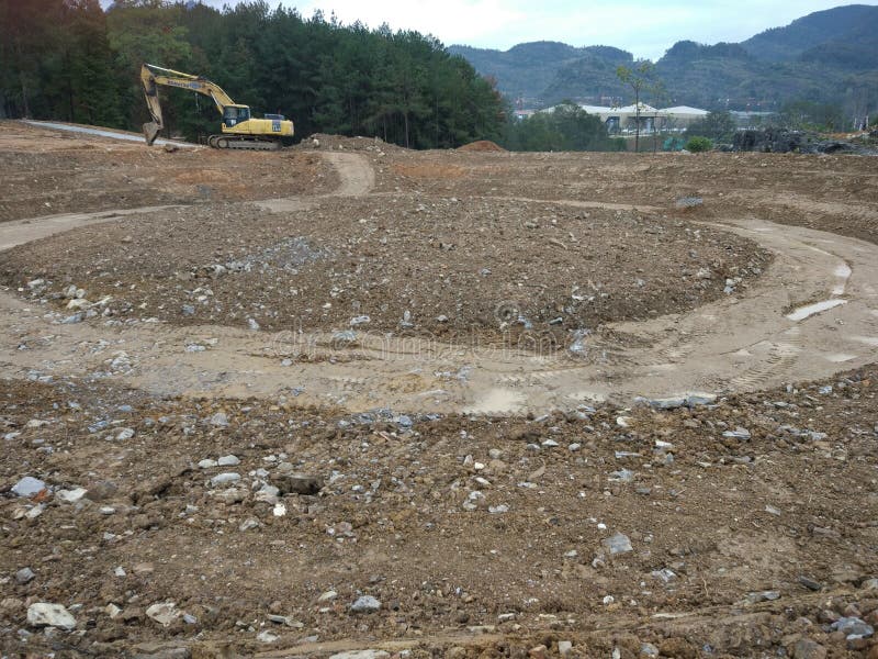 This Excavator is in the Process of Earthwork Construction Stock Photo ...