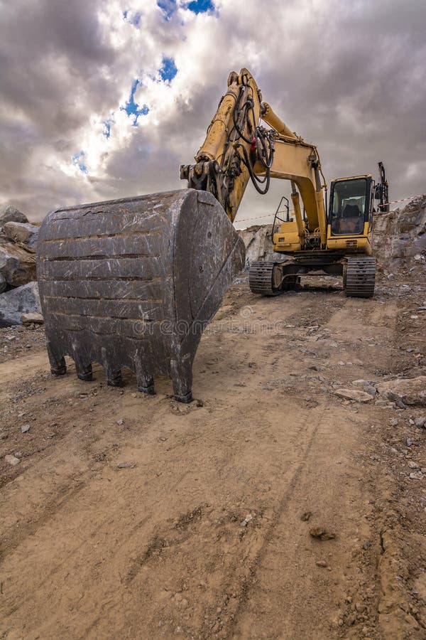 Excavator in a Quarry Extracting Stone Stock Image - Image of machinery ...