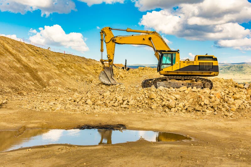 Excavator in a Quarry Extracting Stone Stock Image - Image of equipment ...
