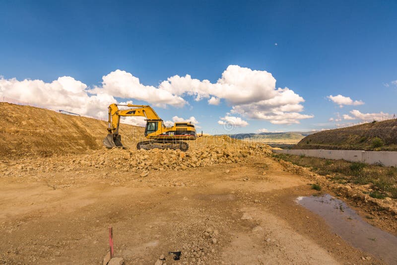Excavator in a Quarry Extracting Stone Stock Photo - Image of machinery ...