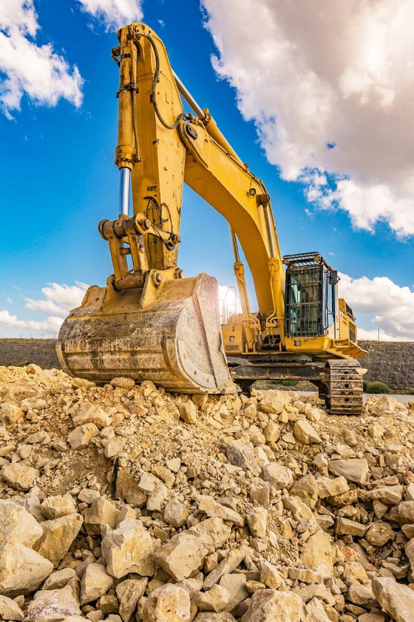 Excavator in a Quarry Extracting Stone Stock Photo - Image of road ...