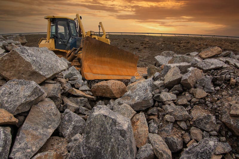 Excavator Surrounded by Granite Rock To Transform into Gravel Stock ...