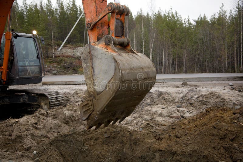 Excavator with a Raised Bucket Stock Photo - Image of industry, repair ...