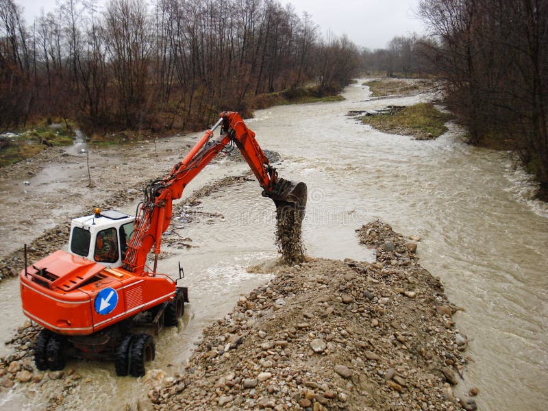 Excavator on river stock photo. Image of metal, dirt - 111991948