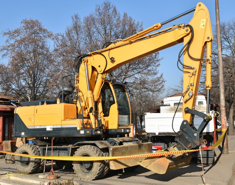 Excavator at the Road Construction Stock Image - Image of rebuilding ...