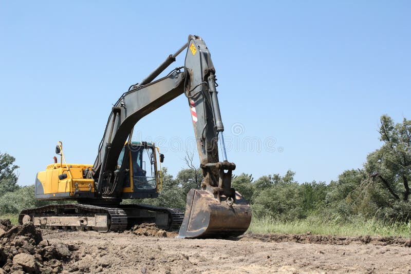 Excavator on Road Construction Stock Photo - Image of moving, large ...